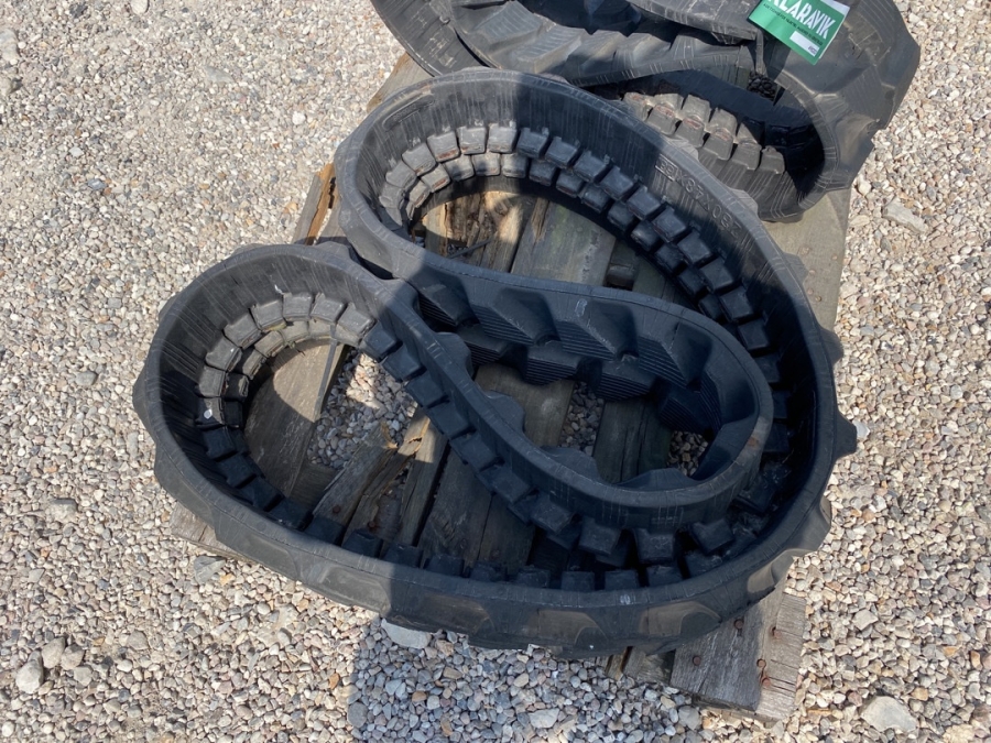 Klaravik Auktioner | Bælter til minigraver